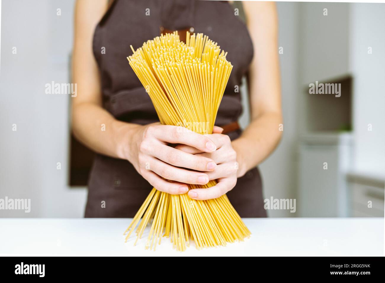 Female hands holding pasta hi-res stock photography and images - Alamy