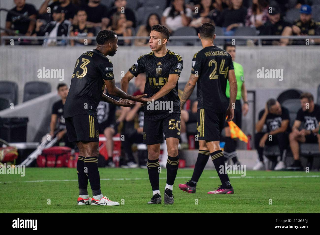 LAFC midfielder Kellyn Acosta (23) celebrates with midfielder Filip ...