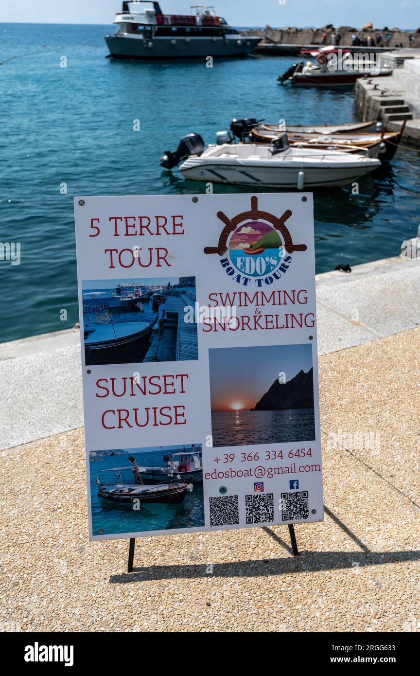 A 5 Terre boat cruise tours sign on the seafront at Monterosso al ...