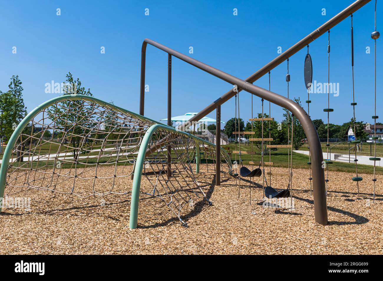 Modern wooden playground and climbing park for children and kids in ...