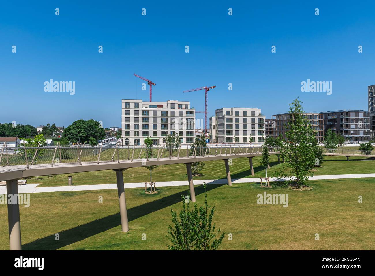 View from a new park to newly constructed blocks of flats, concept for ...