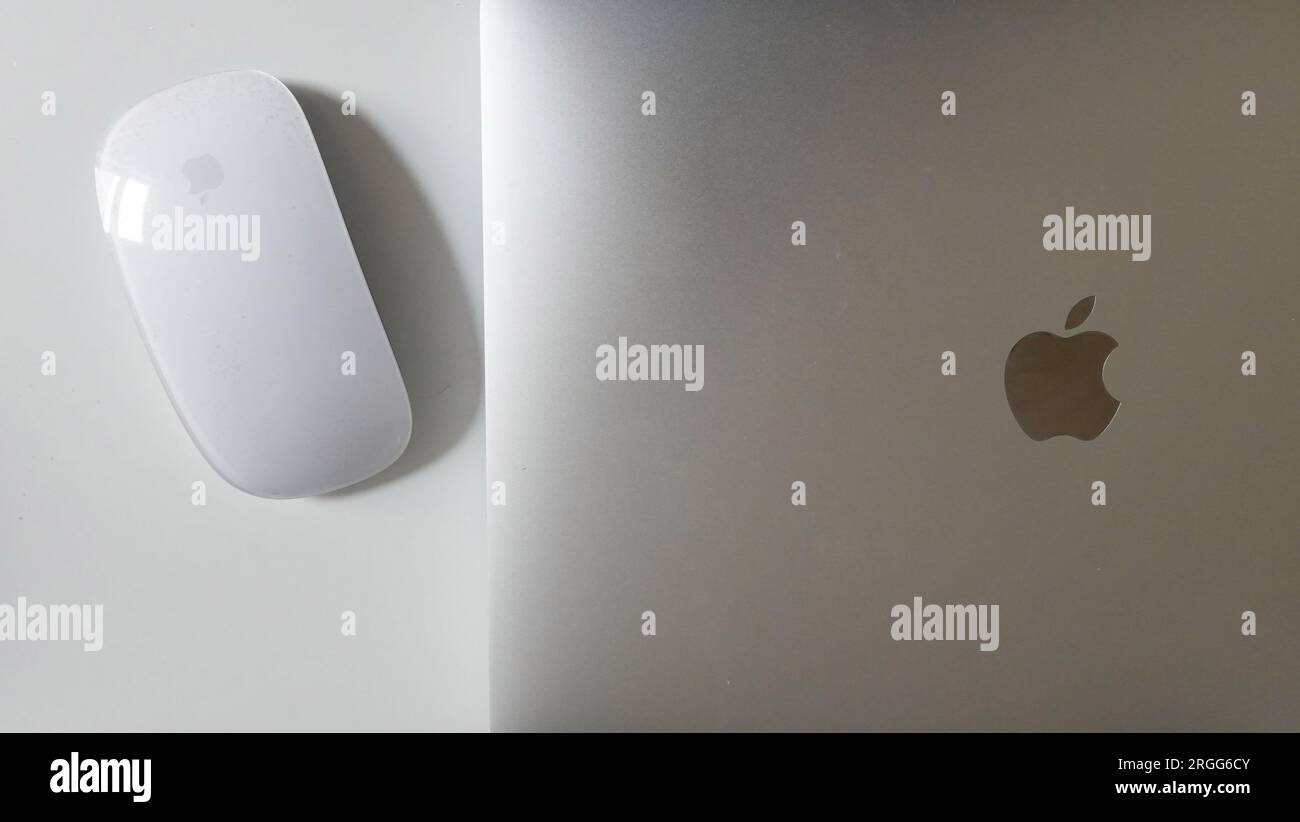 Magic Mouse and M2 MacBook Air Stock Photo - Alamy