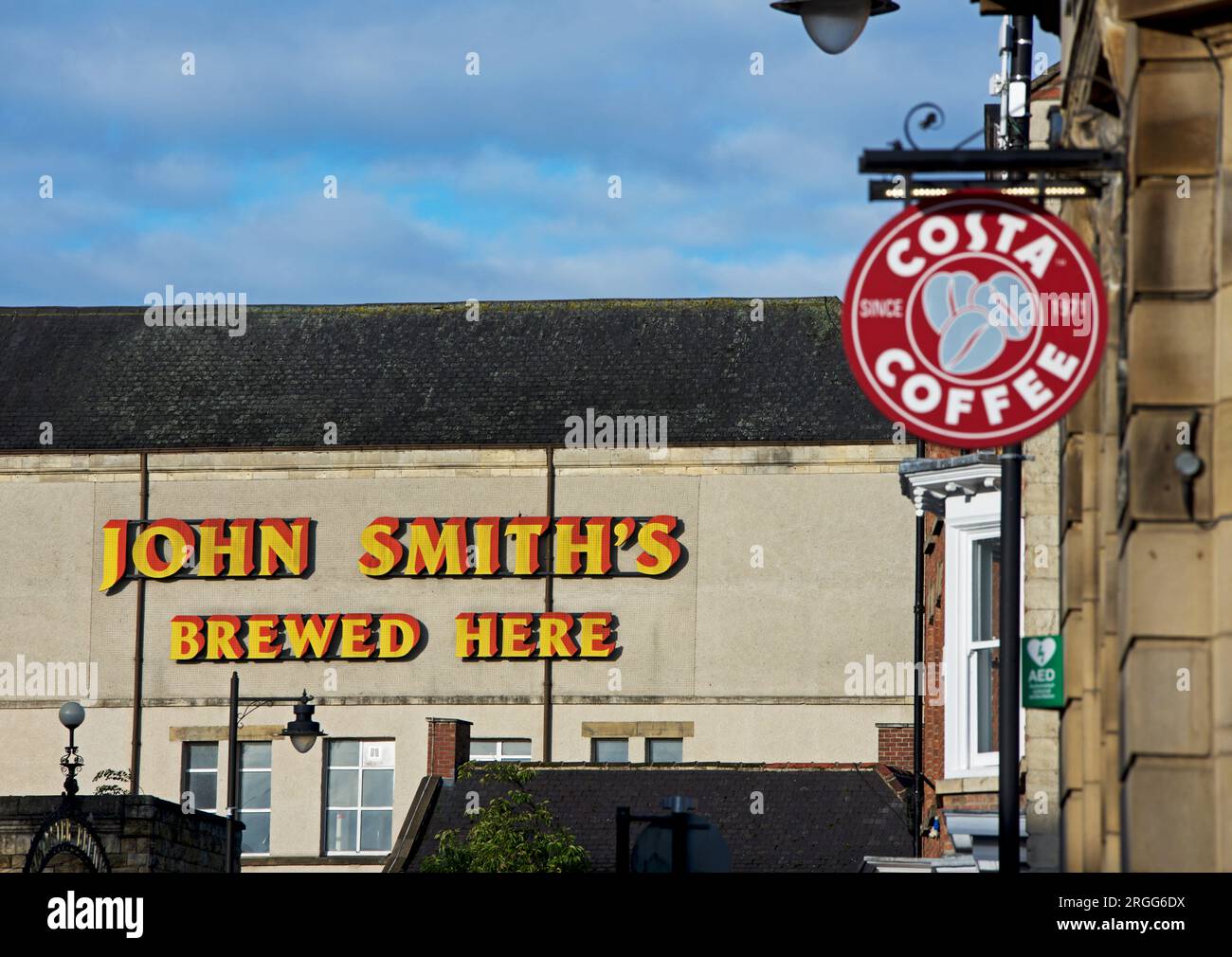 Costa Coffee sign and the John Smith's Brewery in Tadcaster, North ...