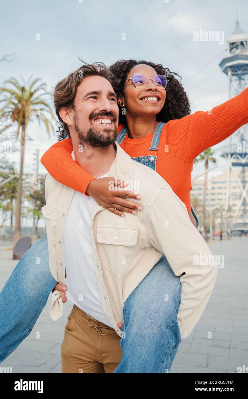 Vertical portrait of couple having fun together on a romantic date ...