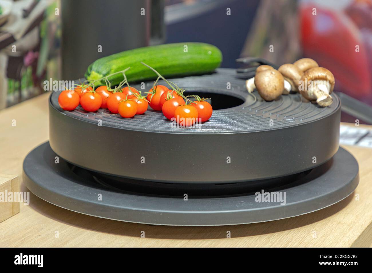 Fresh Vegetables at Round Portable Tabletop Mini Grill BBQ Stock Photo ...