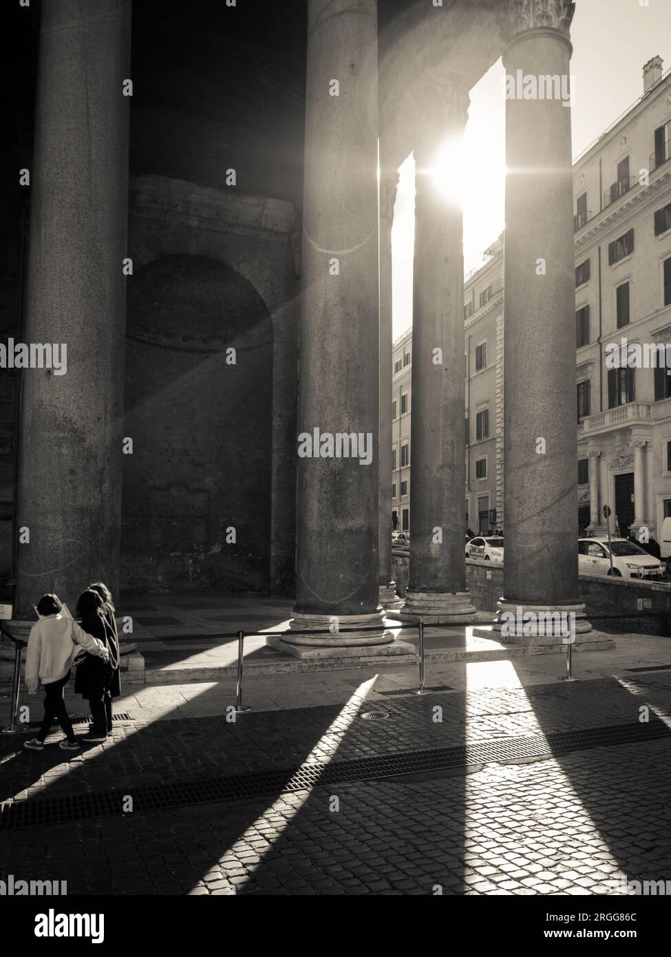 The sun shines through the columns of the Pantheon in Rome Stock Photo ...