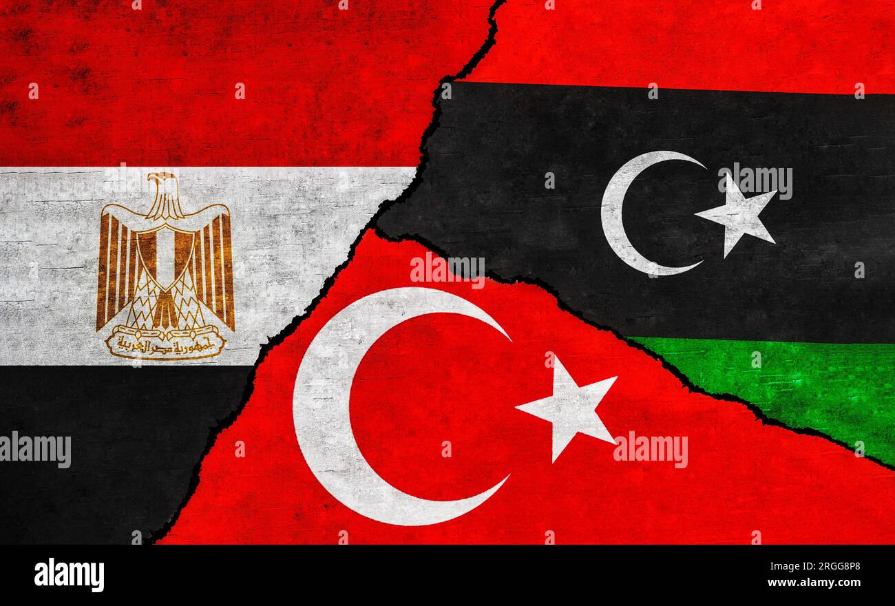 Turkey, Egypt and Libya painted flags on wall with crack. Libya, Egypt ...