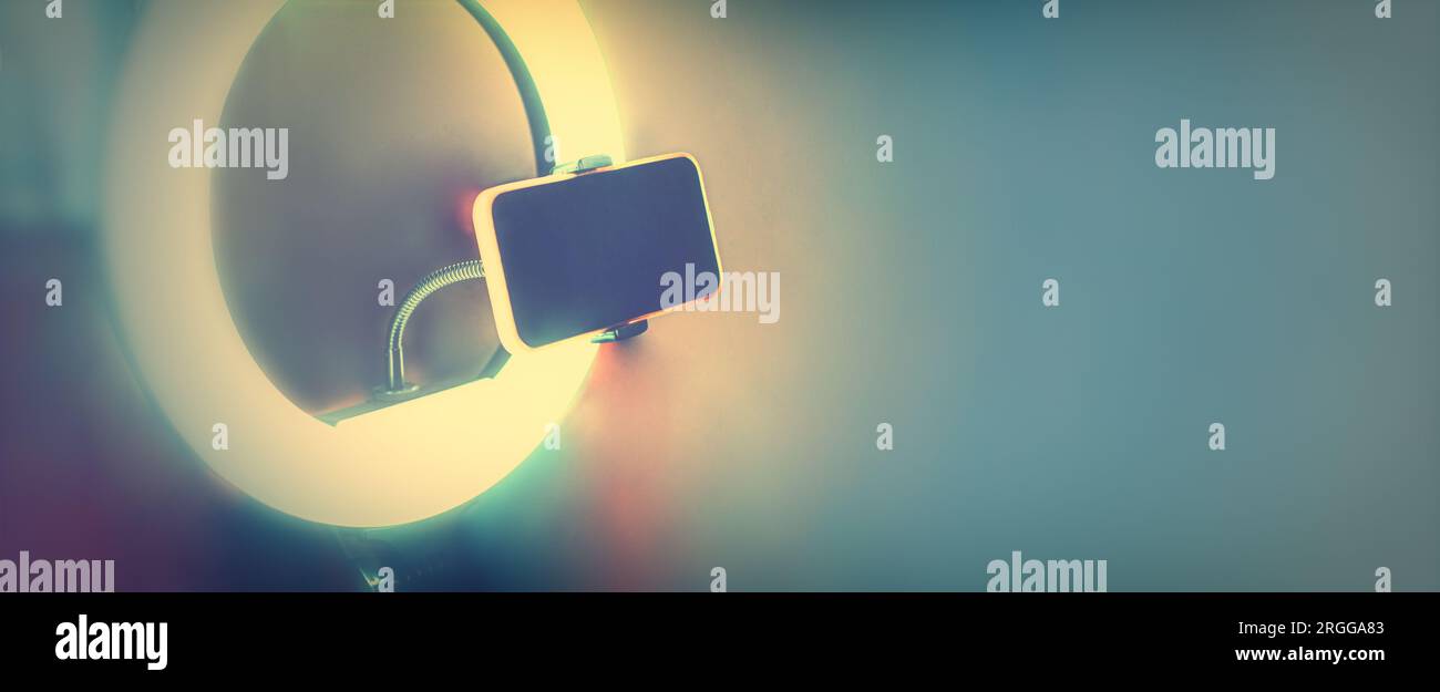 Ring light with smartphone for design, banners and websites on a ...