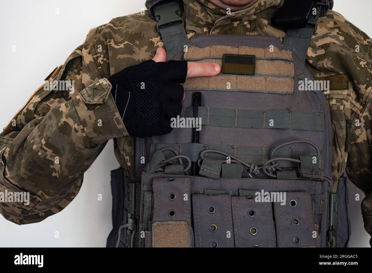Ukrainian soldier in military pixel unform and bulletproof vest jacket ...