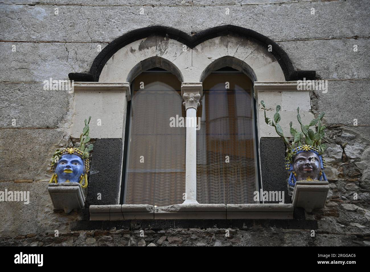 Gothic style arched ogival windows in Taormina Sicily, Italy Stock ...