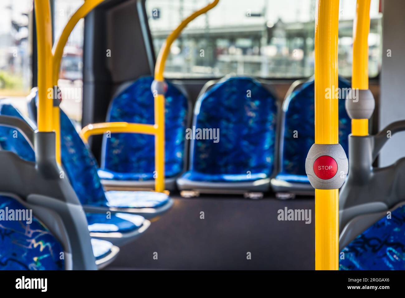 Stop button on the modern public transport bus. Empty bus interior ... Stop button on the modern public transport bus. Empty bus interior ...