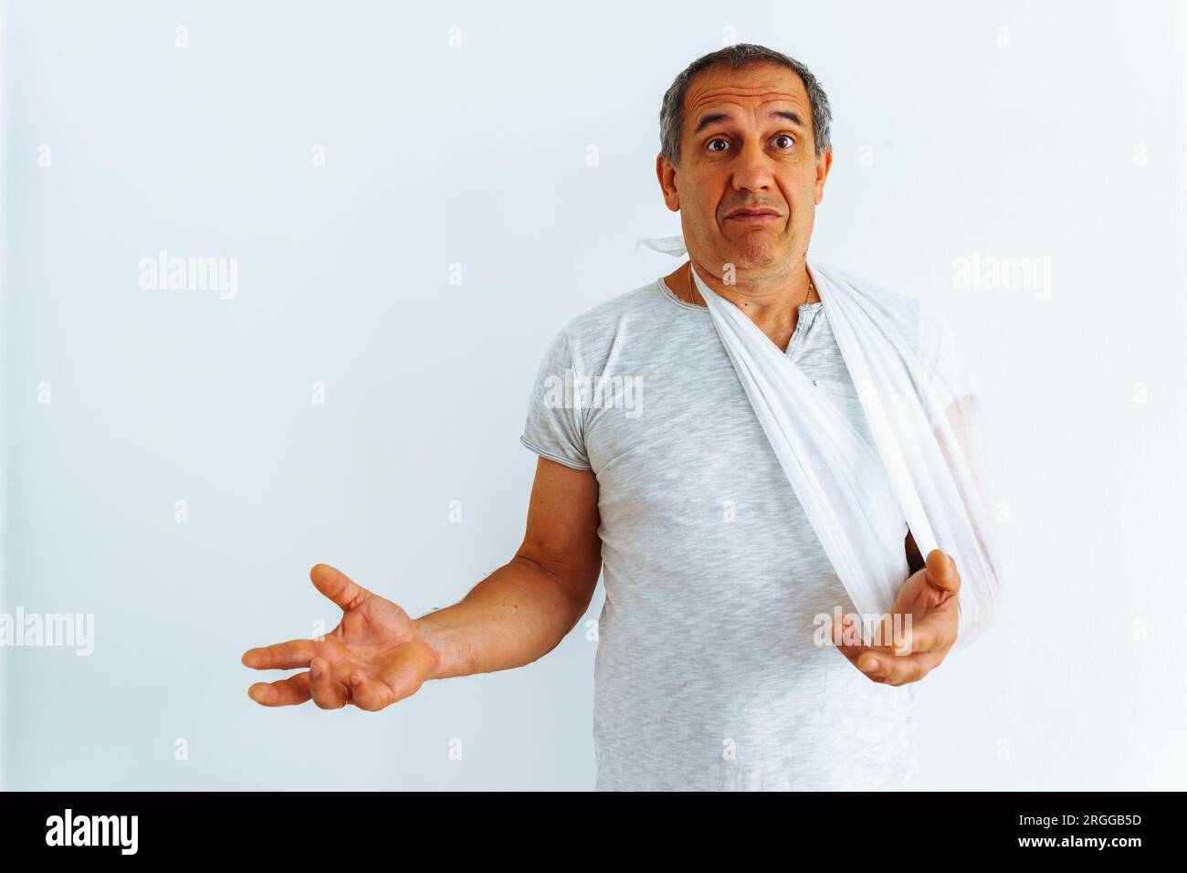 Middle-aged man with cast on arm Stock Photo - Alamy