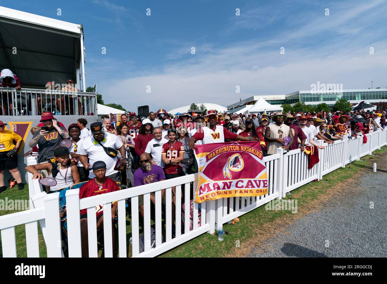 Washington Commanders fans watch a NFL football practice at the team's ...