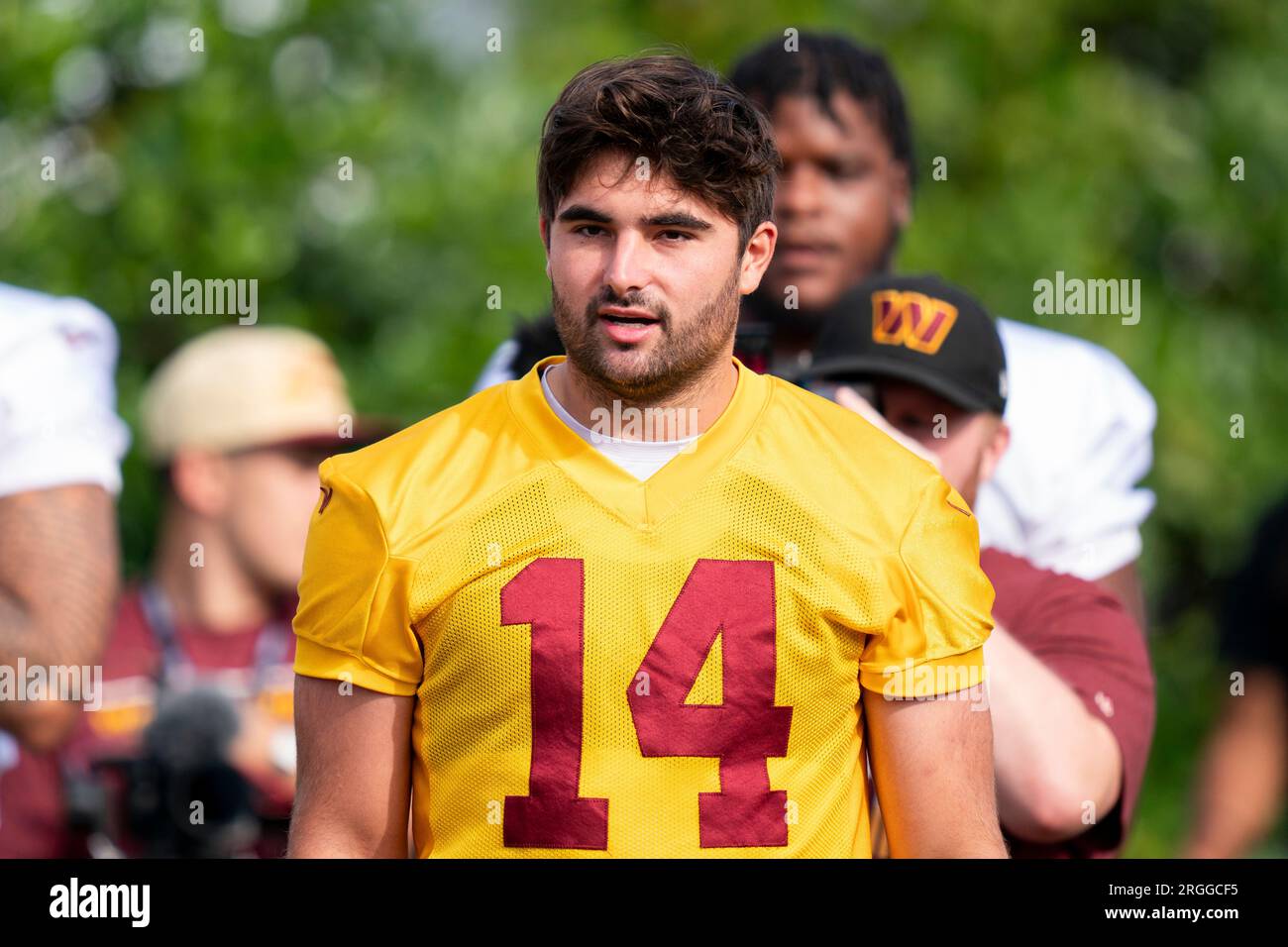 Washington Commanders quarterback Sam Howell approaches the field ...