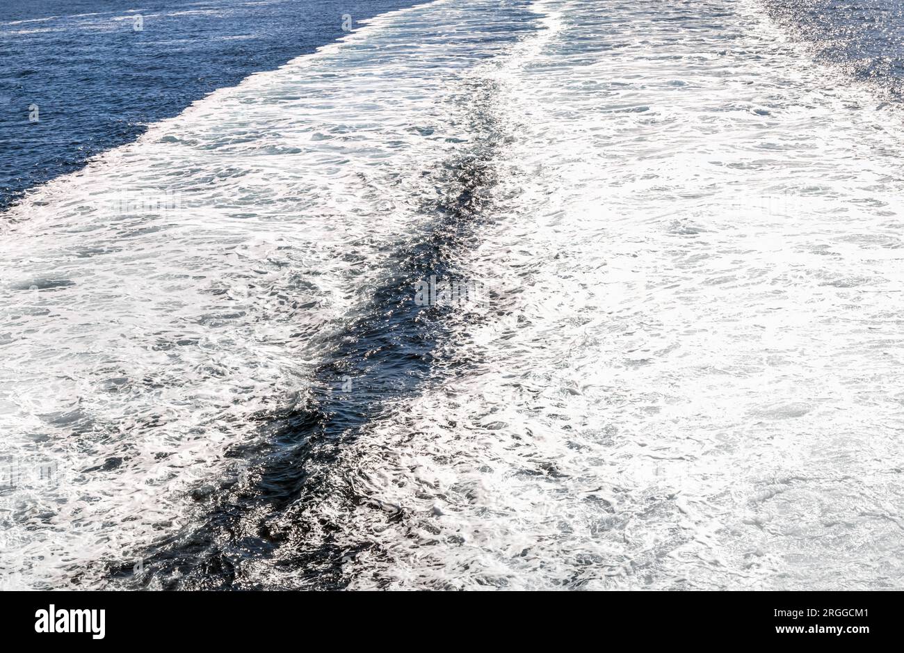 Water trail behind cruise ship. Wave from the ship at sea Stock Photo ...