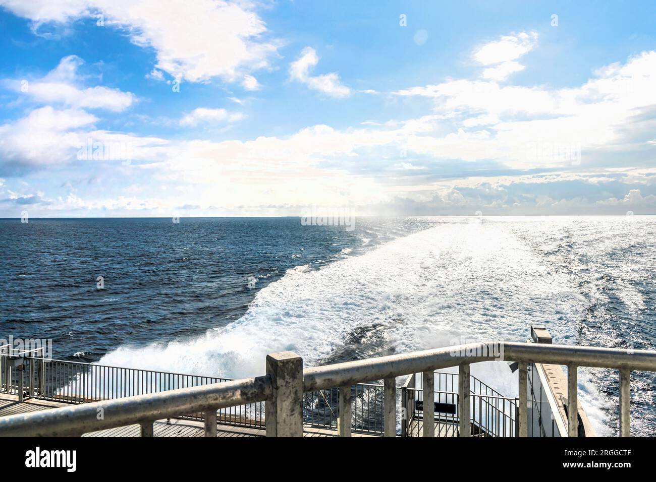 Water trail behind cruise ship. Wave from the ship at sea Stock Photo ...