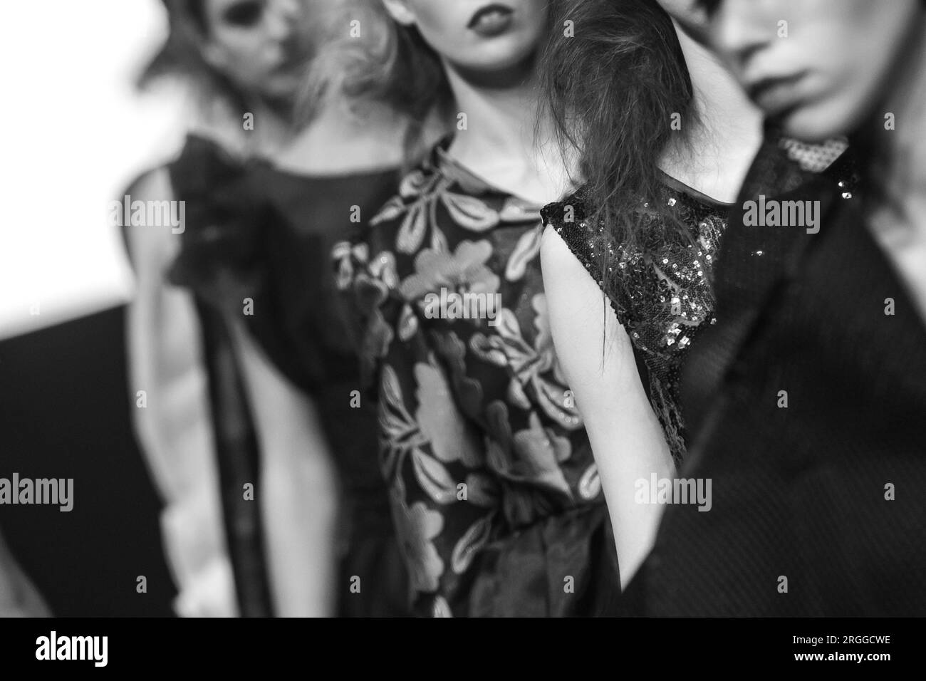 Models on stage clothes show Black and White Stock Photos & Images - Alamy