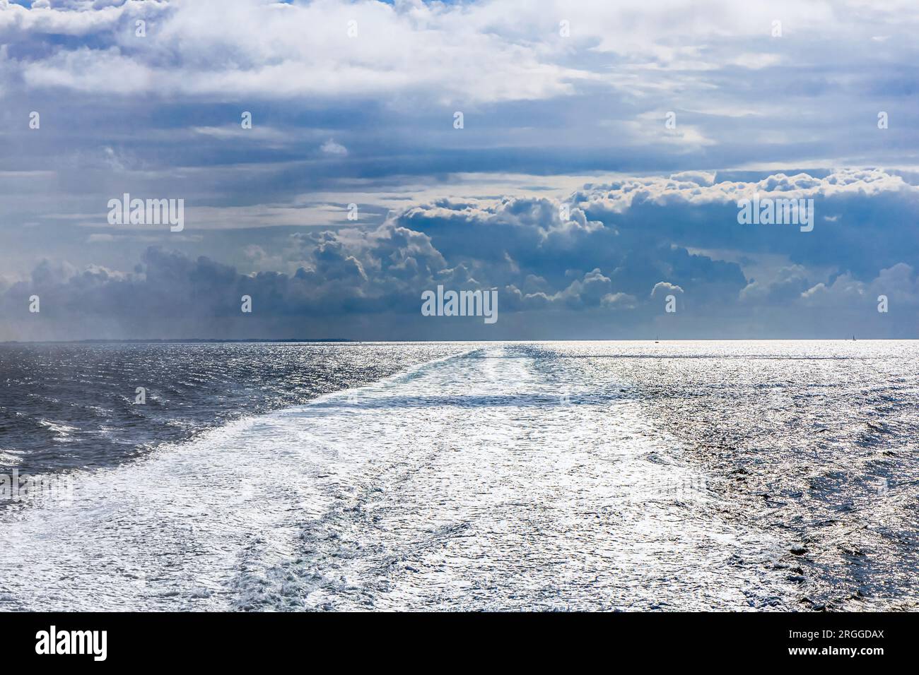 Water trail behind cruise ship. Wave from the ship at sea Stock Photo ...