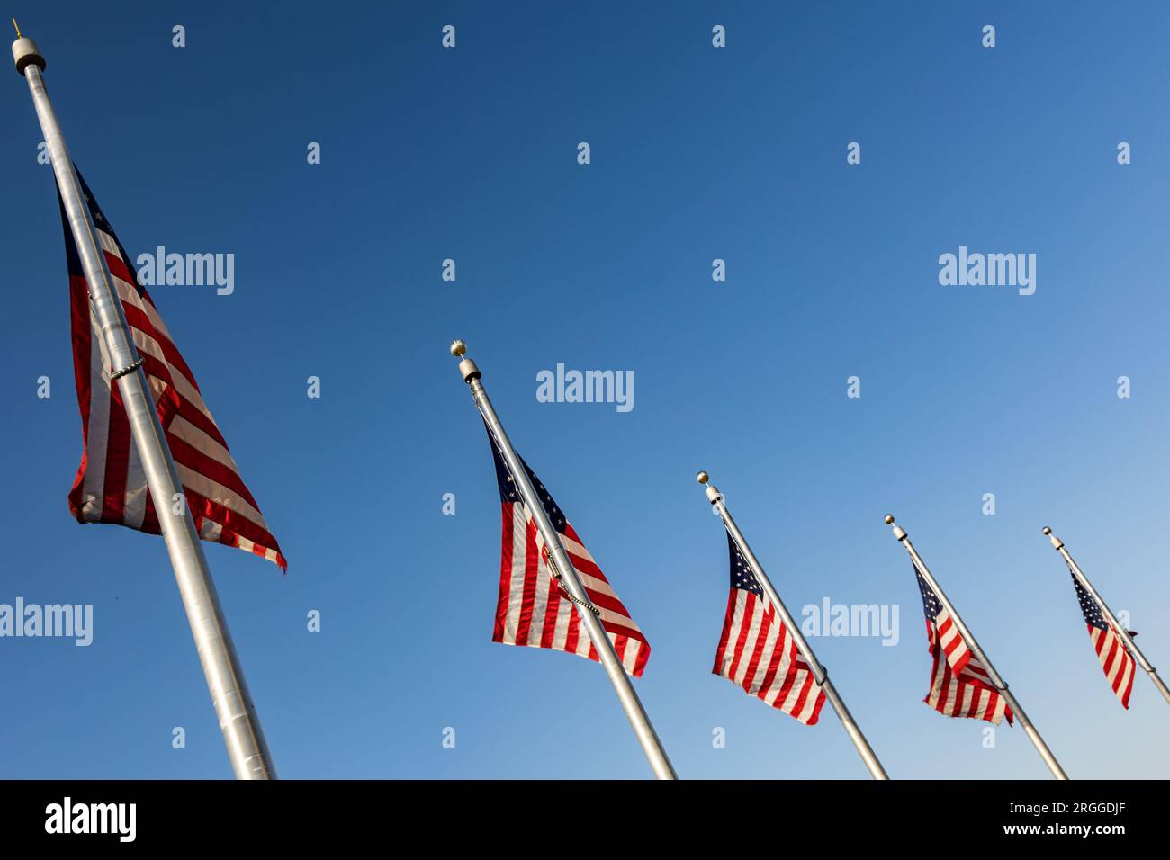 Flying american flags hi-res stock photography and images - Alamy