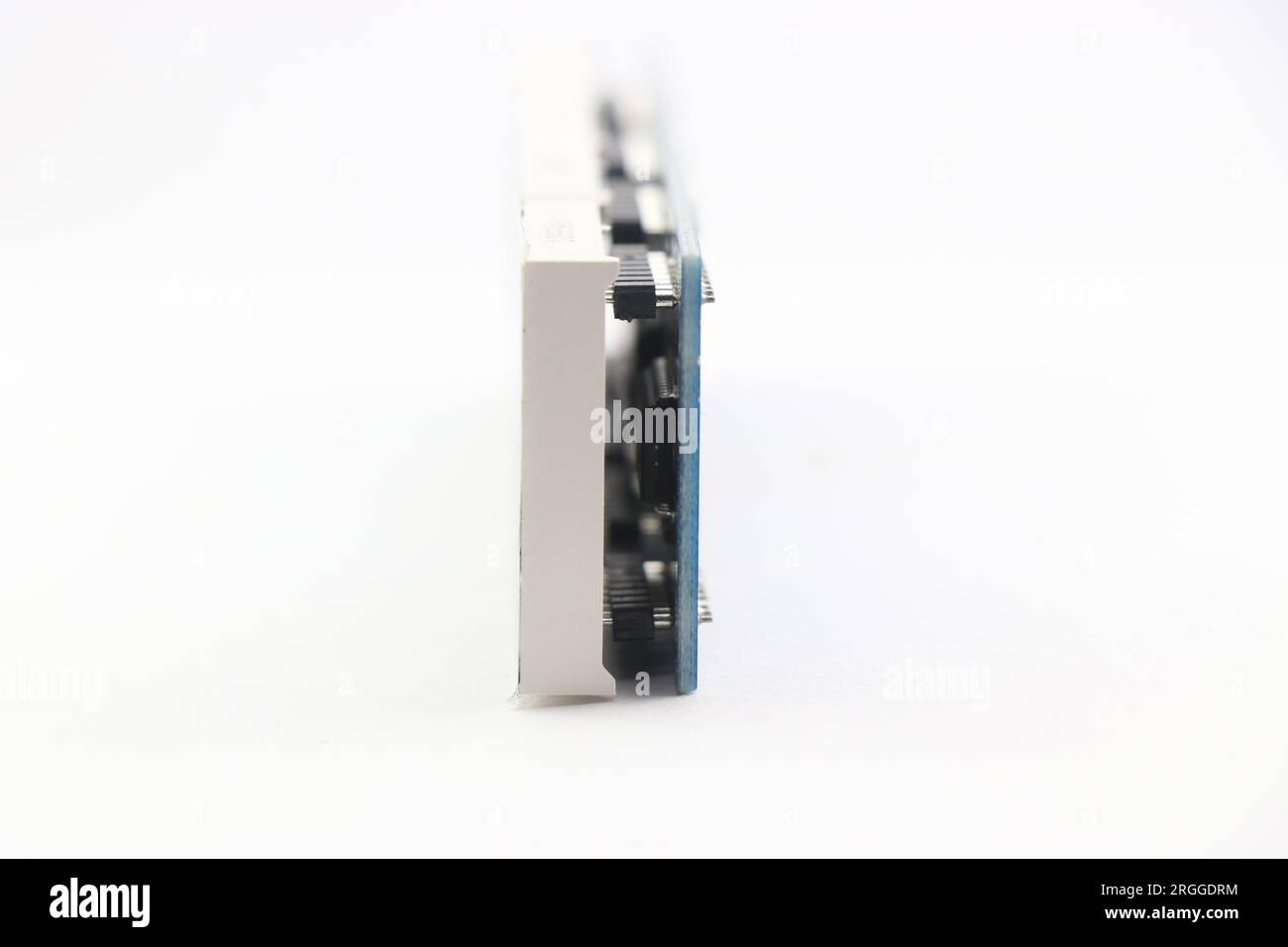 side view of an LED matrix display board with the series of connections ...