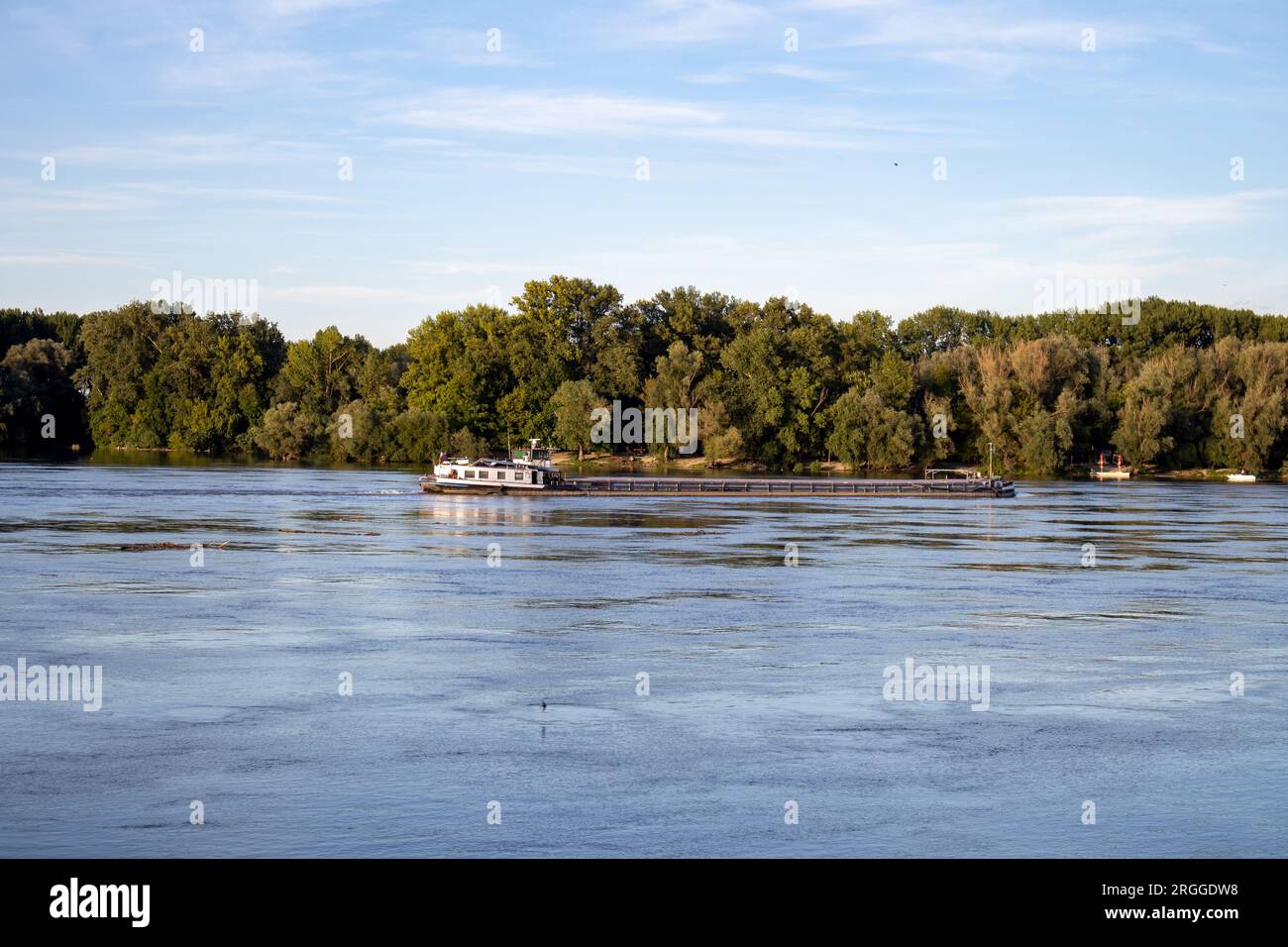 A long cargo ship on the Danube Stock Photo - Alamy