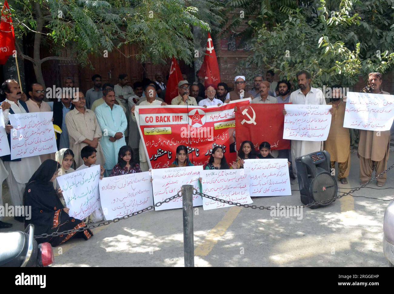 Some holding the communist daily hi-res stock photography and images ...