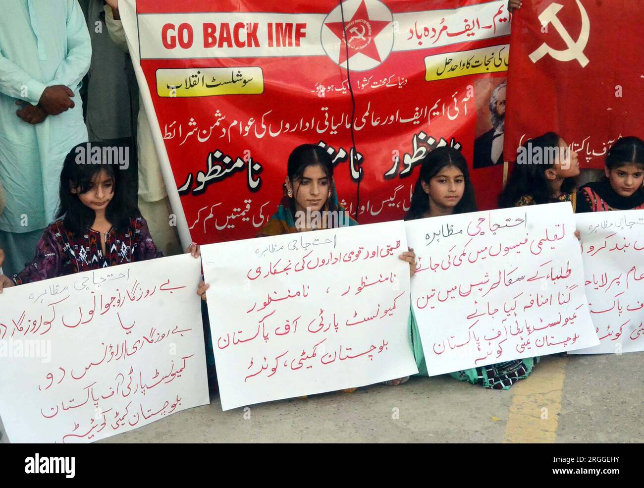 Some holding the communist daily hi-res stock photography and images ...