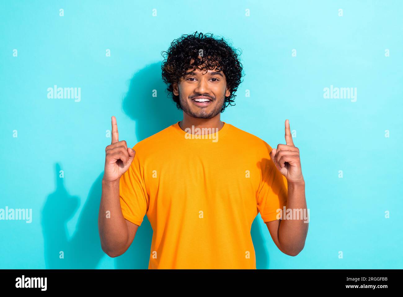 Portrait of positive friendly person beaming smile indicate fingers up ...