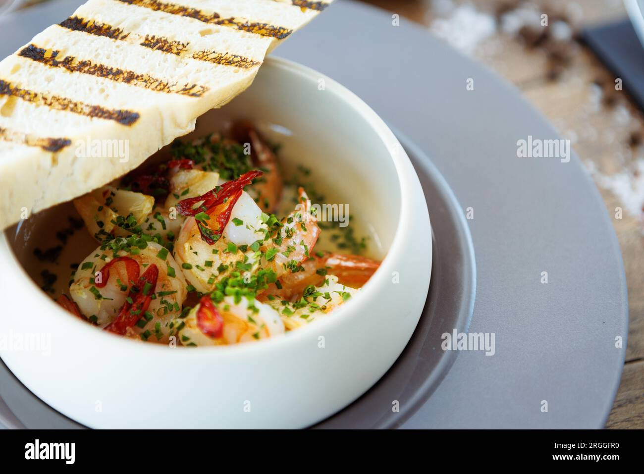 Shrimp pil-pil. King prawns, garlic, chilli and baguette. Delicious ...