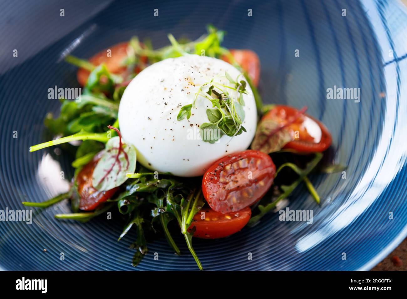 Burrata with paprika-truffle jam and cherry-cluster tomato salad ...