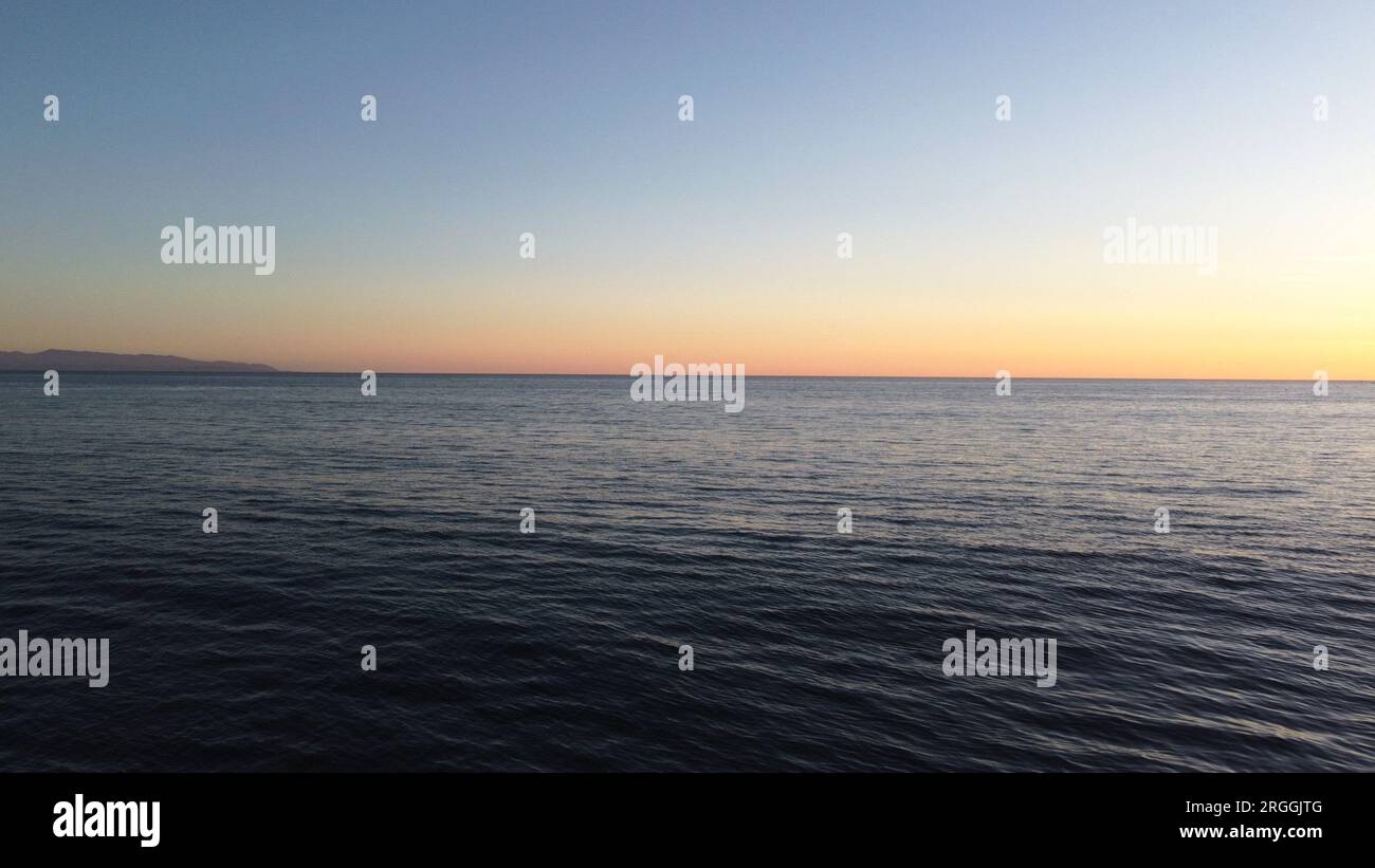 Beautiful sunset in ocean hi-res stock photography and images - Alamy