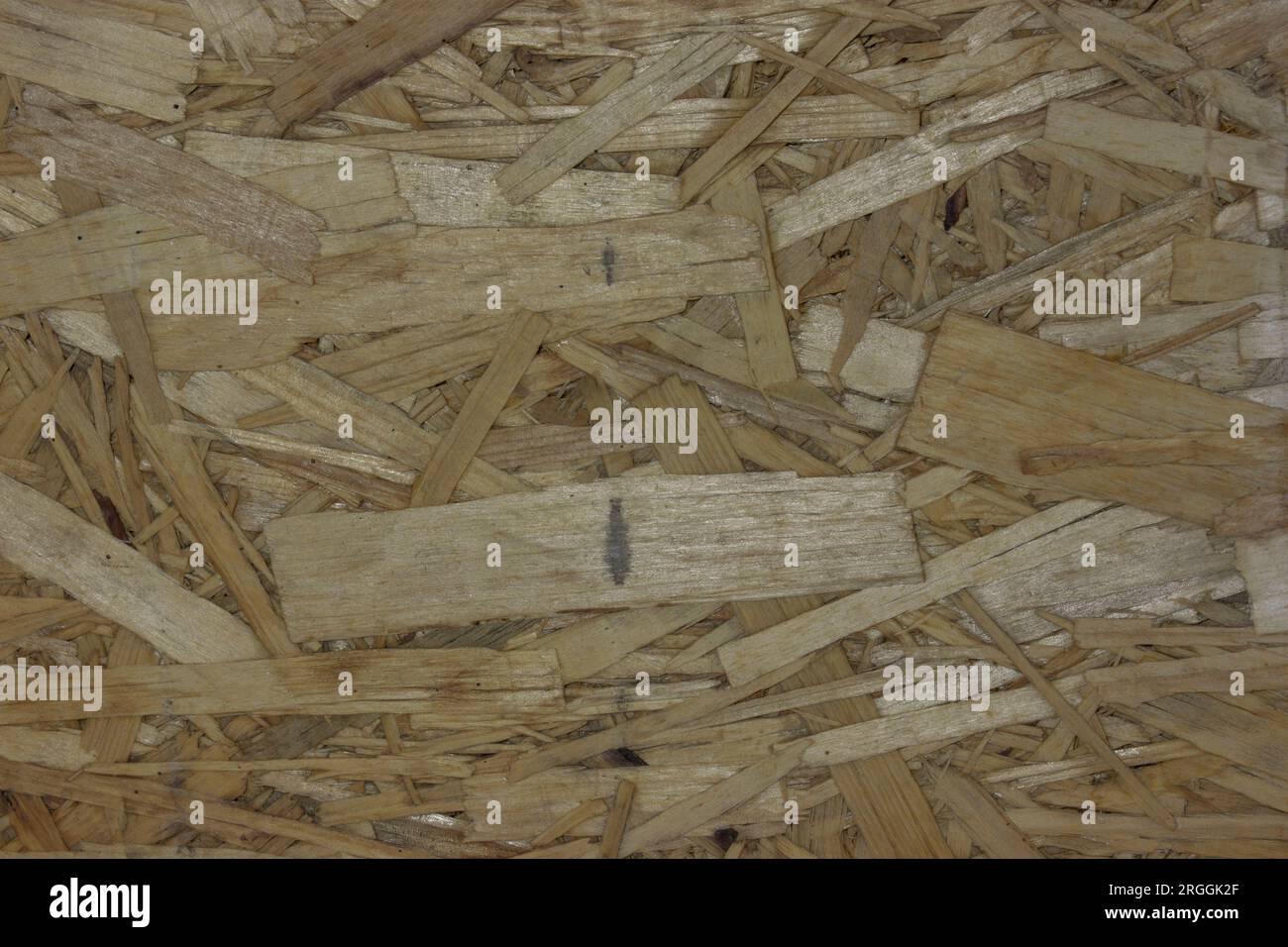 OSB board texture. Brown wooden background. A simple pattern from ...