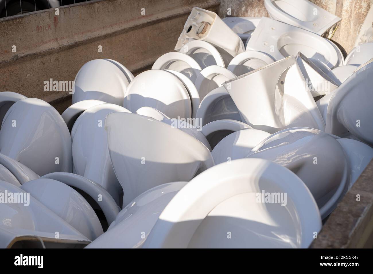 Toilet bowls Removed for renovation of apartments. Construction waste ...