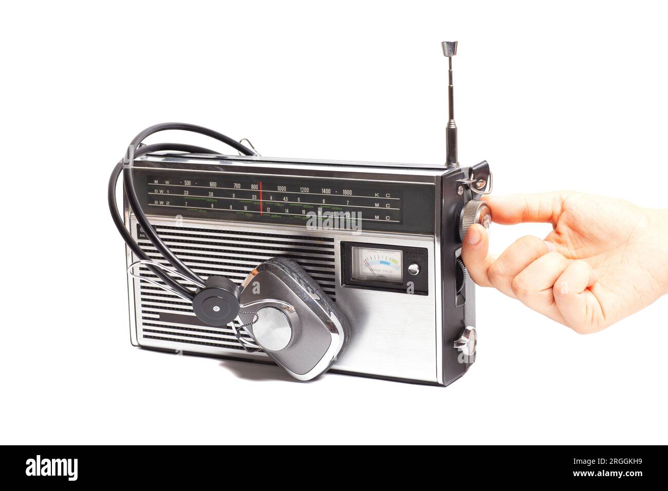 Hand tuning radio receiver button Stock Photo - Alamy