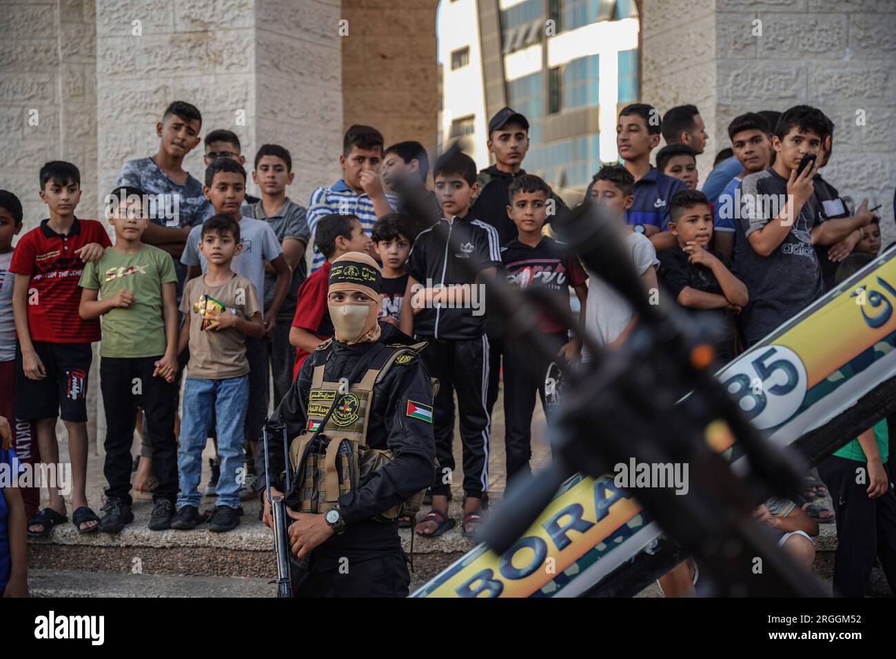 Gaza, Gaza, Palestine. 9th Aug, 2023. Palestinian children stand behind ...