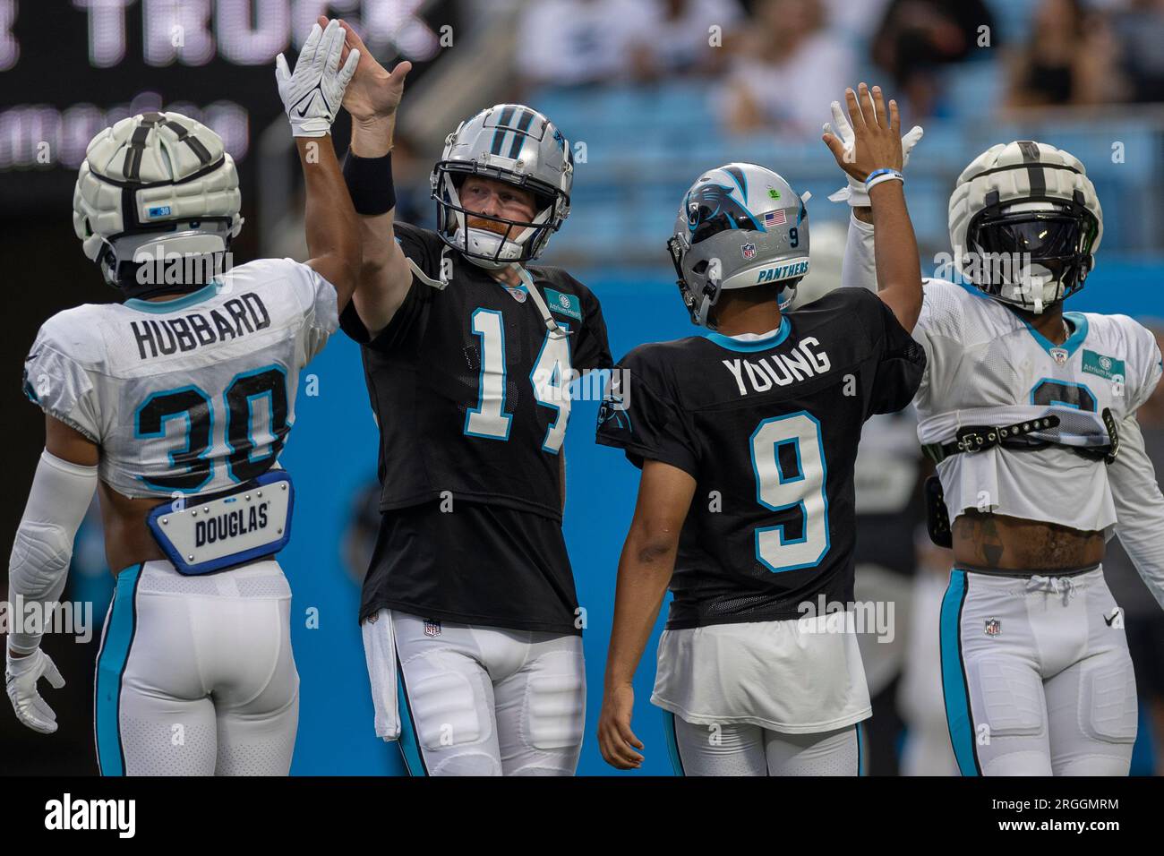 Carolina Panthers quarterbacks Andy Dalton (14) and Chase Young (9 ...