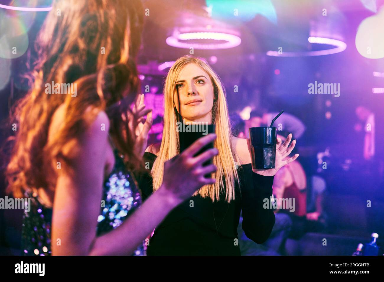 Women drinking night time hi-res stock photography and images - Alamy