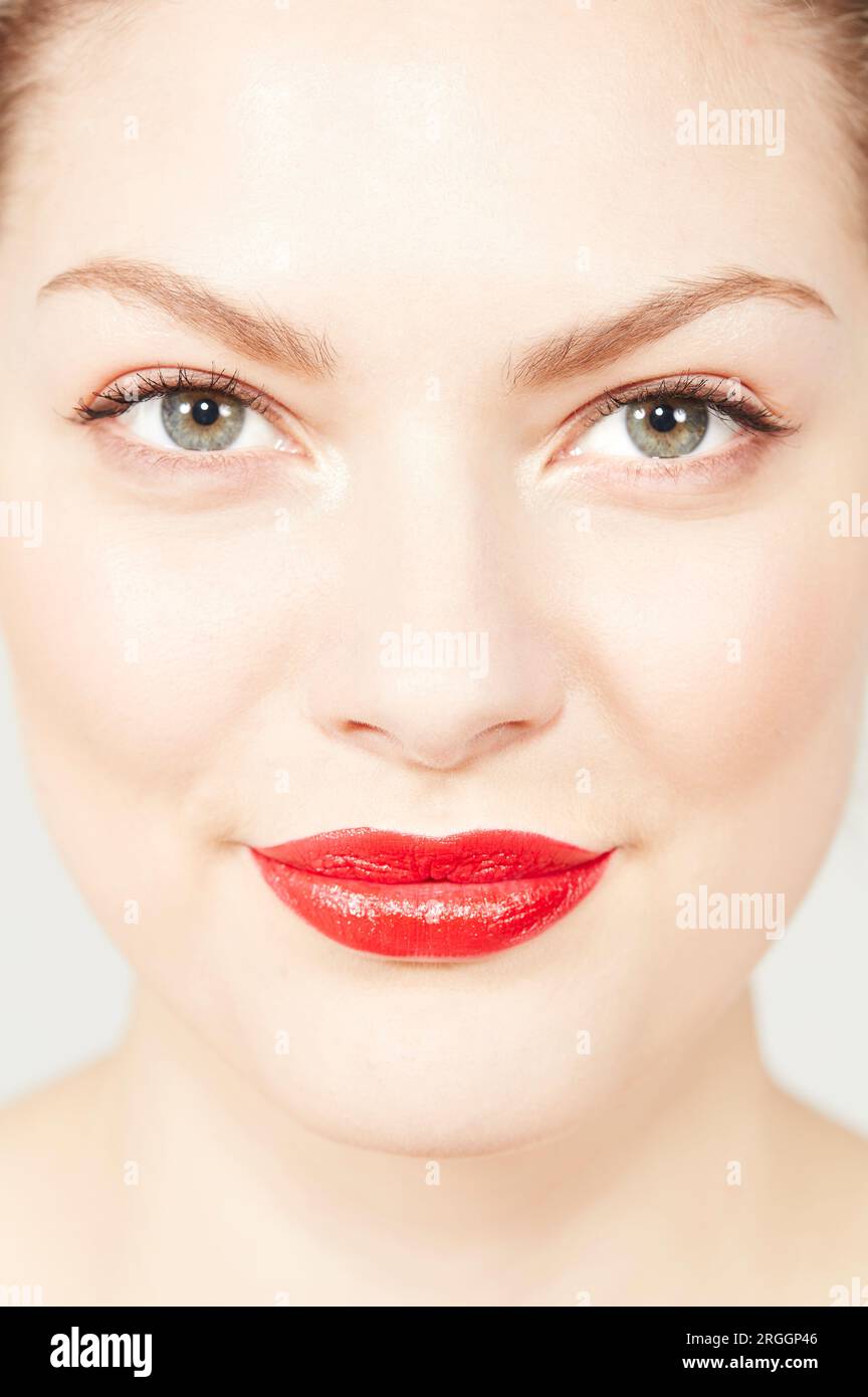 Woman wearing red lipstick hi-res stock photography and images - Alamy