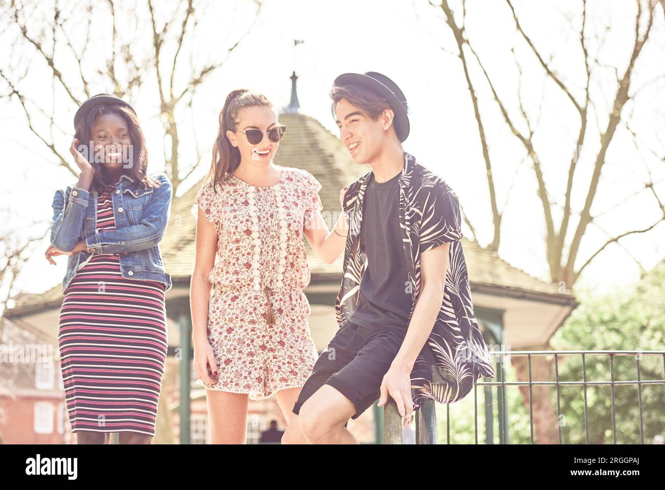 Teenage friends having fun at park Stock Photo - Alamy