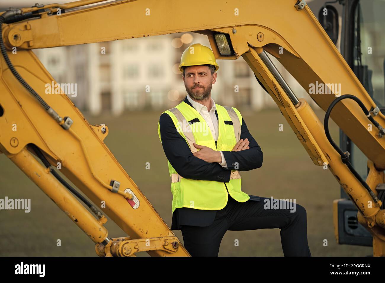 Worker in suit and helmet. Investor civil engineer, construction ...