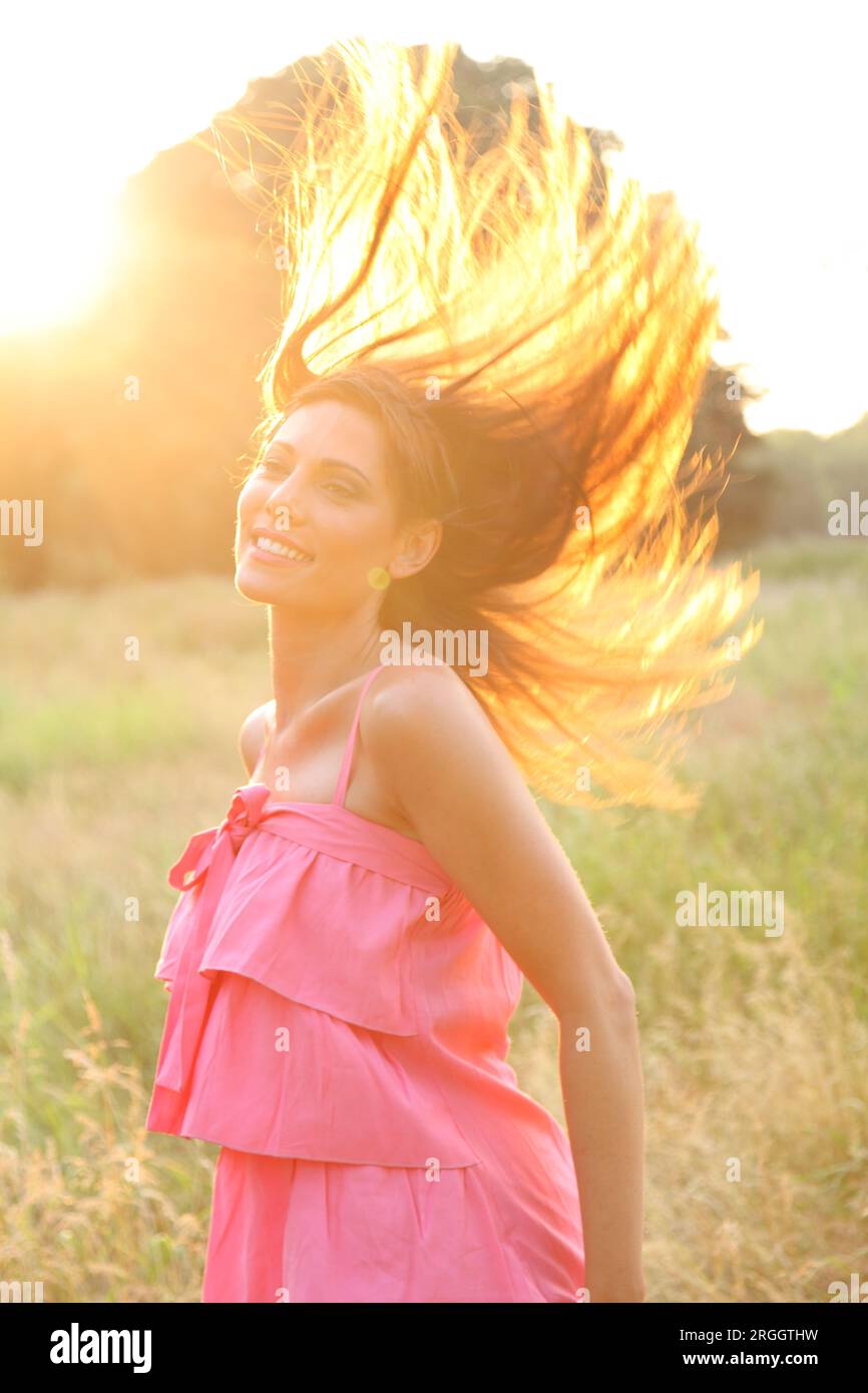 Tossing hair hi-res stock photography and images - Alamy