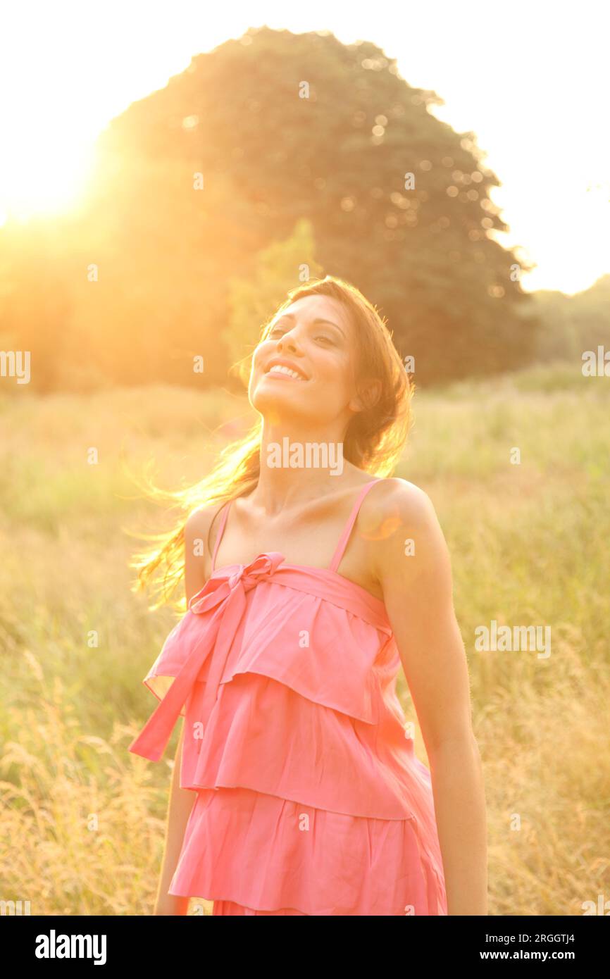 Woman wearing brown dress hi-res stock photography and images - Alamy