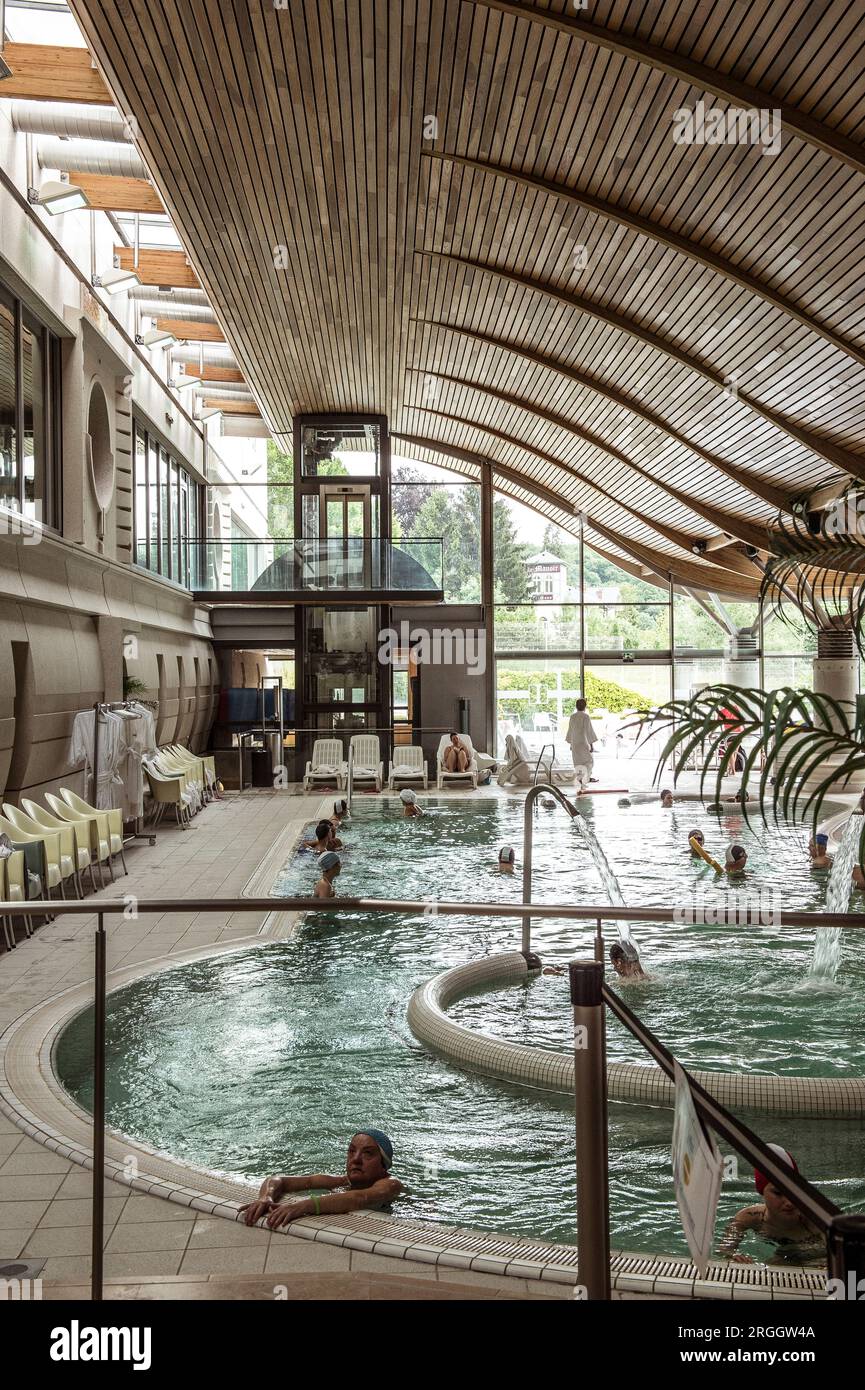 People swimming at indoor swimming pool Stock Photo - Alamy