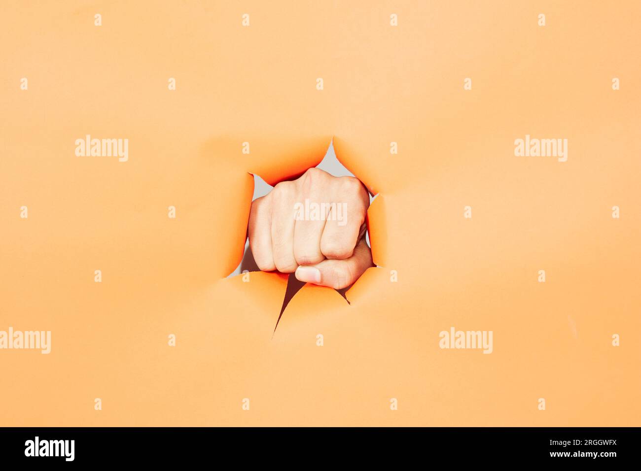 Hand punching hi-res stock photography and images - Alamy