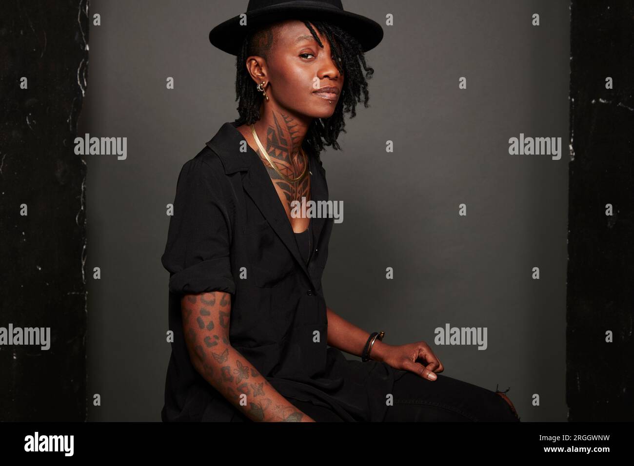 Young woman tattoos dreadlocks hi-res stock photography and images - Alamy