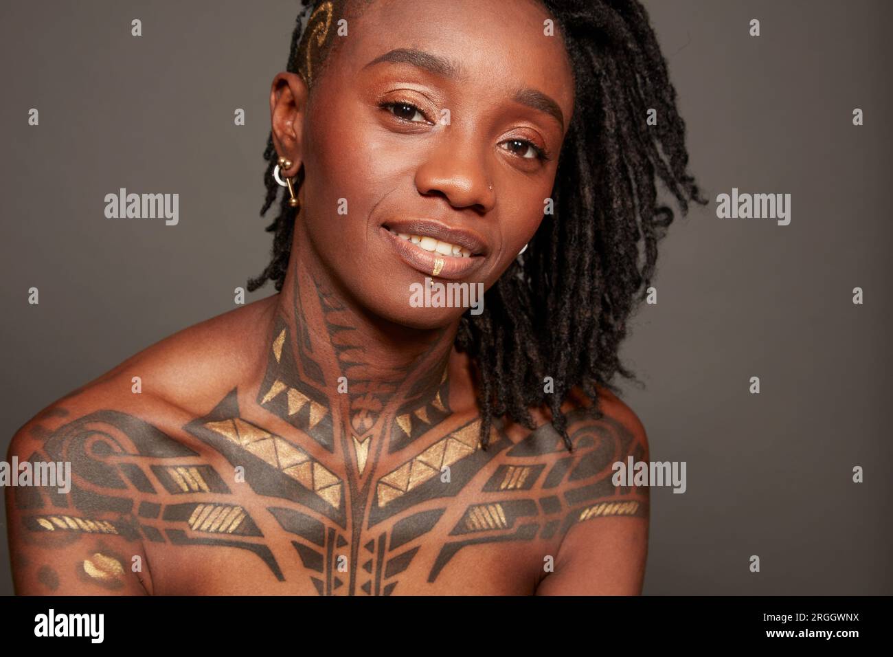 Young woman tattoos dreadlocks hi-res stock photography and images - Alamy