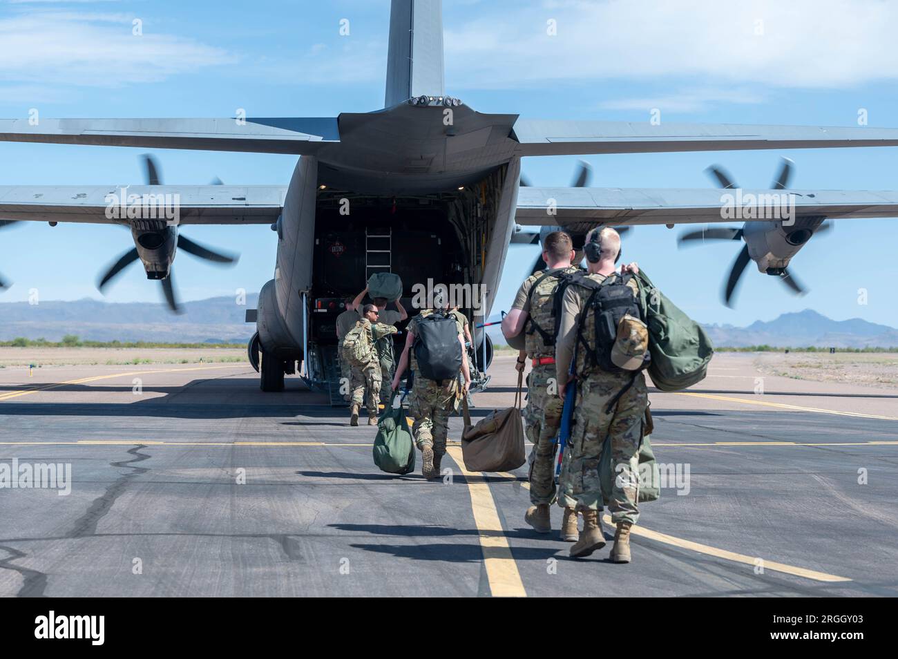 U.S. Air Force Airmen enter the cargo hold of a C-130J Hercules, Dyess ...