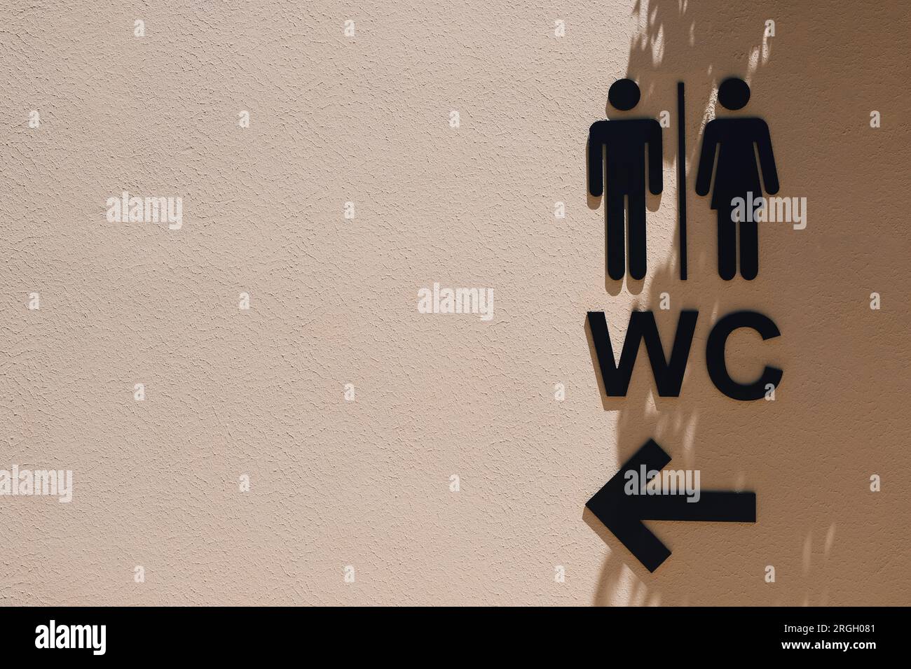 Black male and female public restroom sign with right direction on the ...