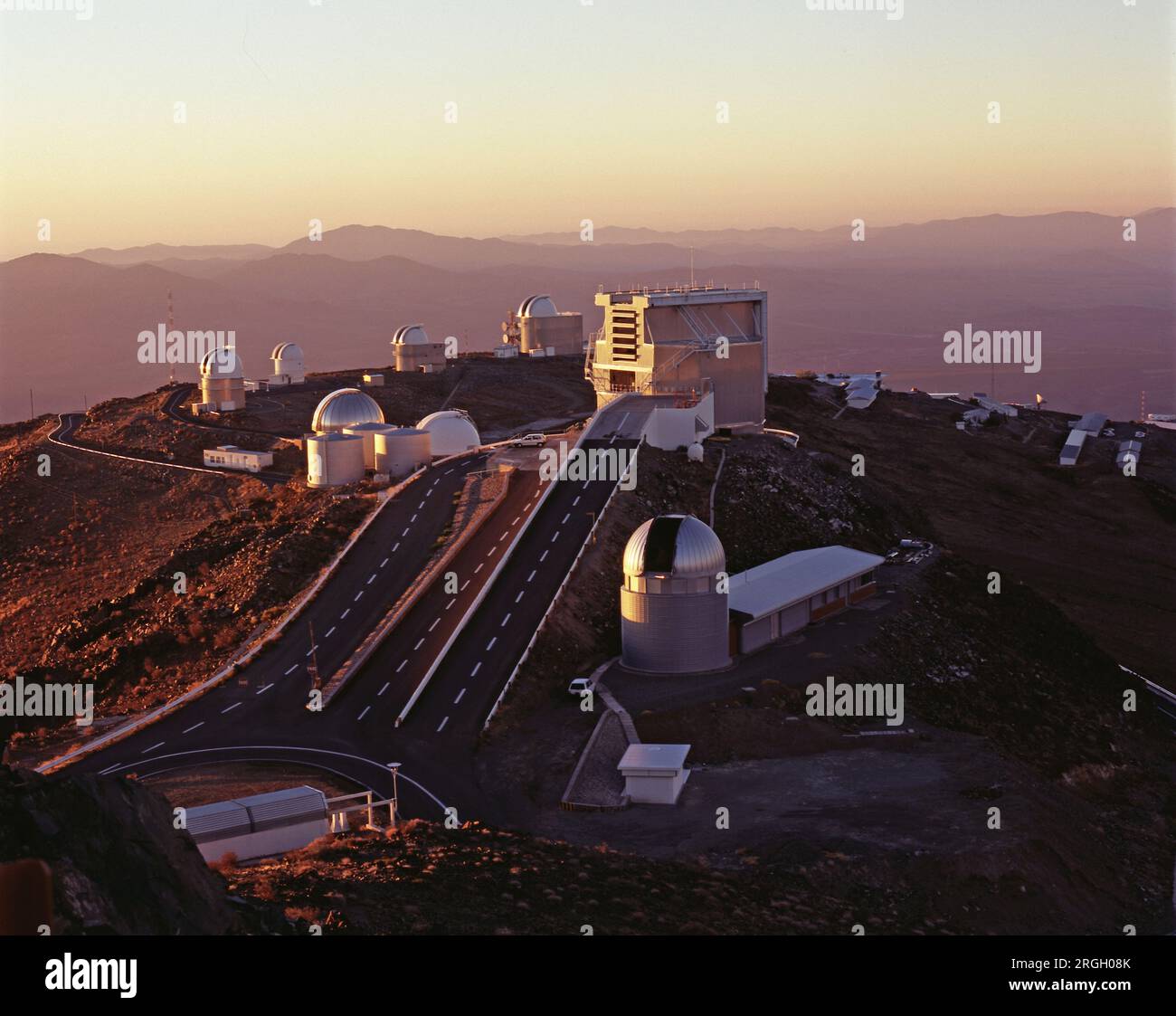 Sunset view of telescopes at La Silla Observatory in Chile Stock Photo ...
