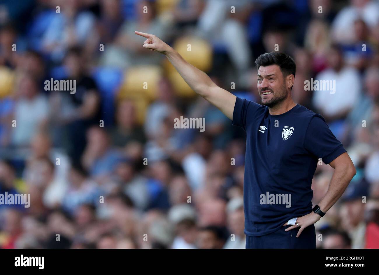 AFC Wimbledon manager Johnnie Jackson on the touchline during the ...